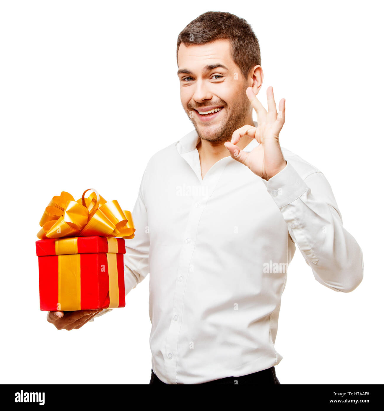 Young man carries heart shaped box Stock Photo - Alamy