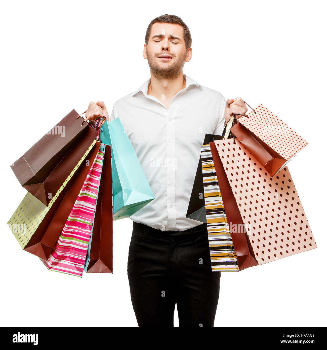 young man with shopping bags Stock Photo - Alamy