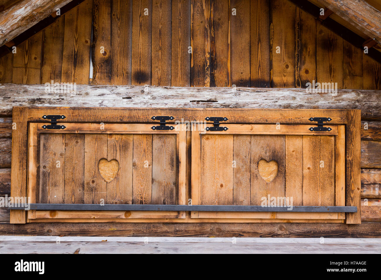 A typical wooden farmhouse window in alps Stock Photo - Alamy