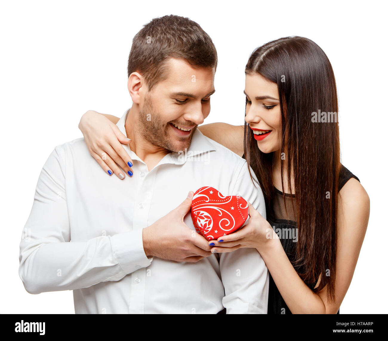 Cheerful holiday couple present hi-res stock photography and images - Alamy