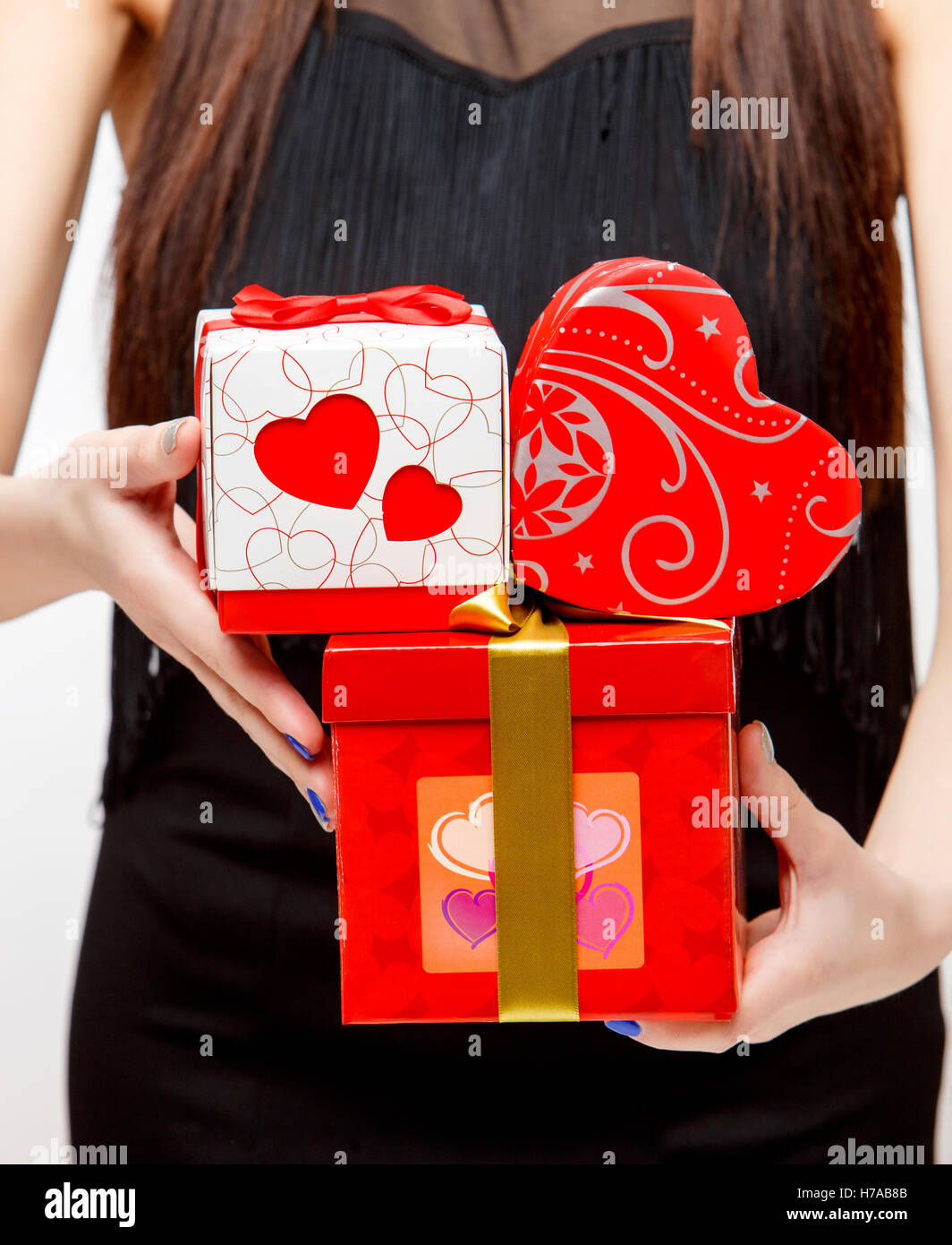 Attractive woman with gift box Stock Photo - Alamy