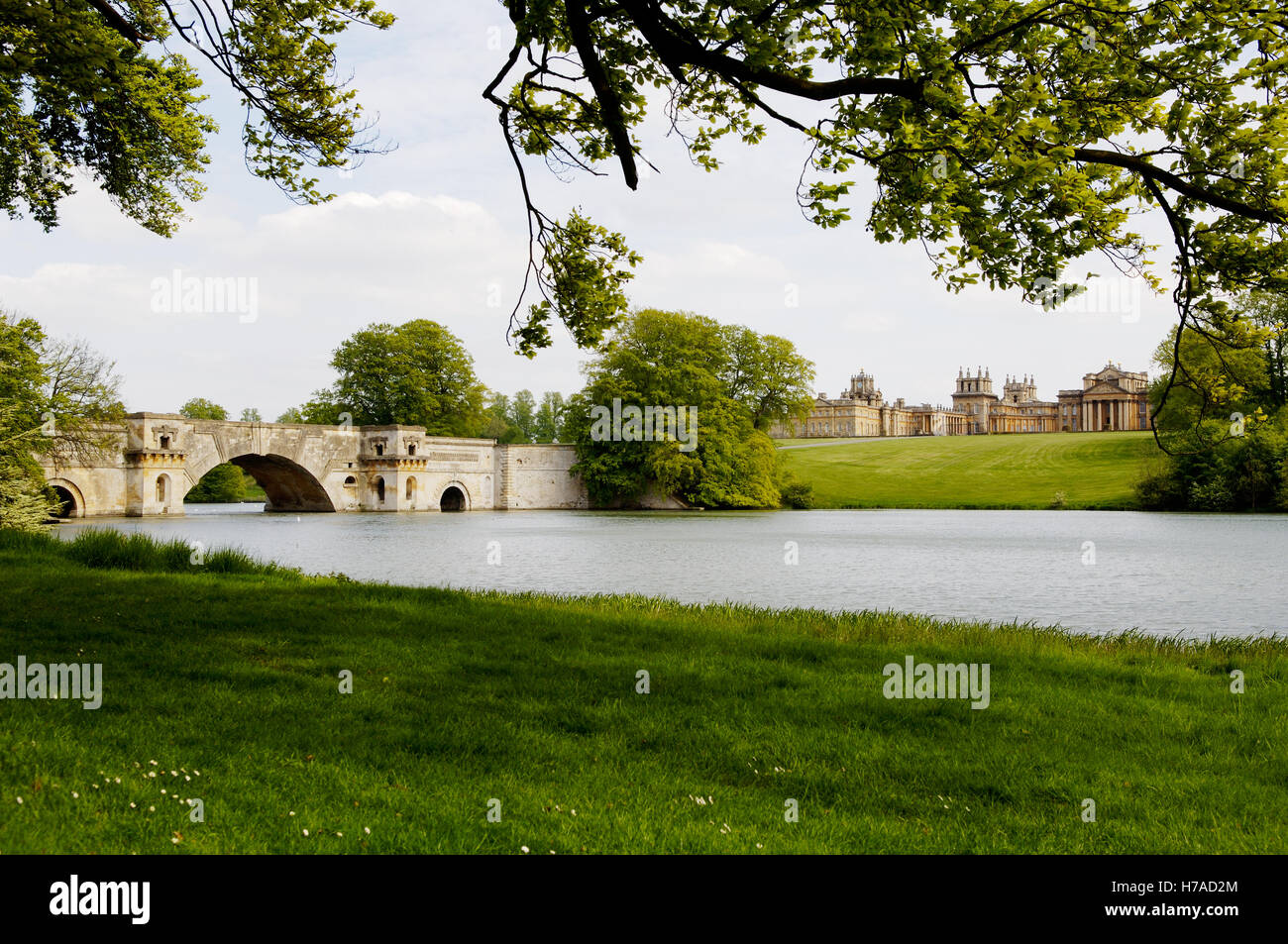 Arched bridgeover river Glyme in grounds of Blenheim Palace ...