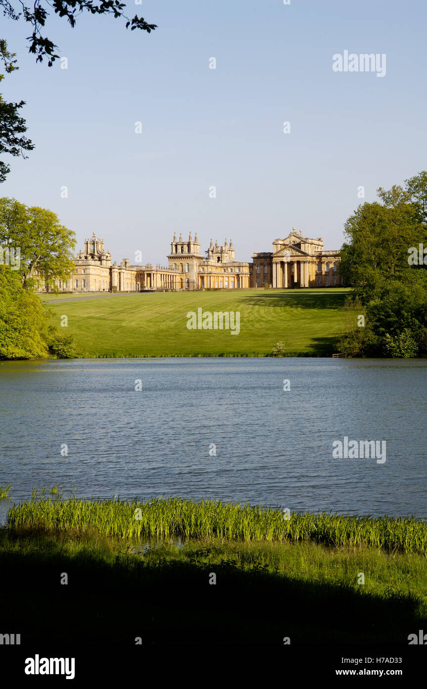 Baroque facade of Blenheim Palace viewed across river Glyme ...