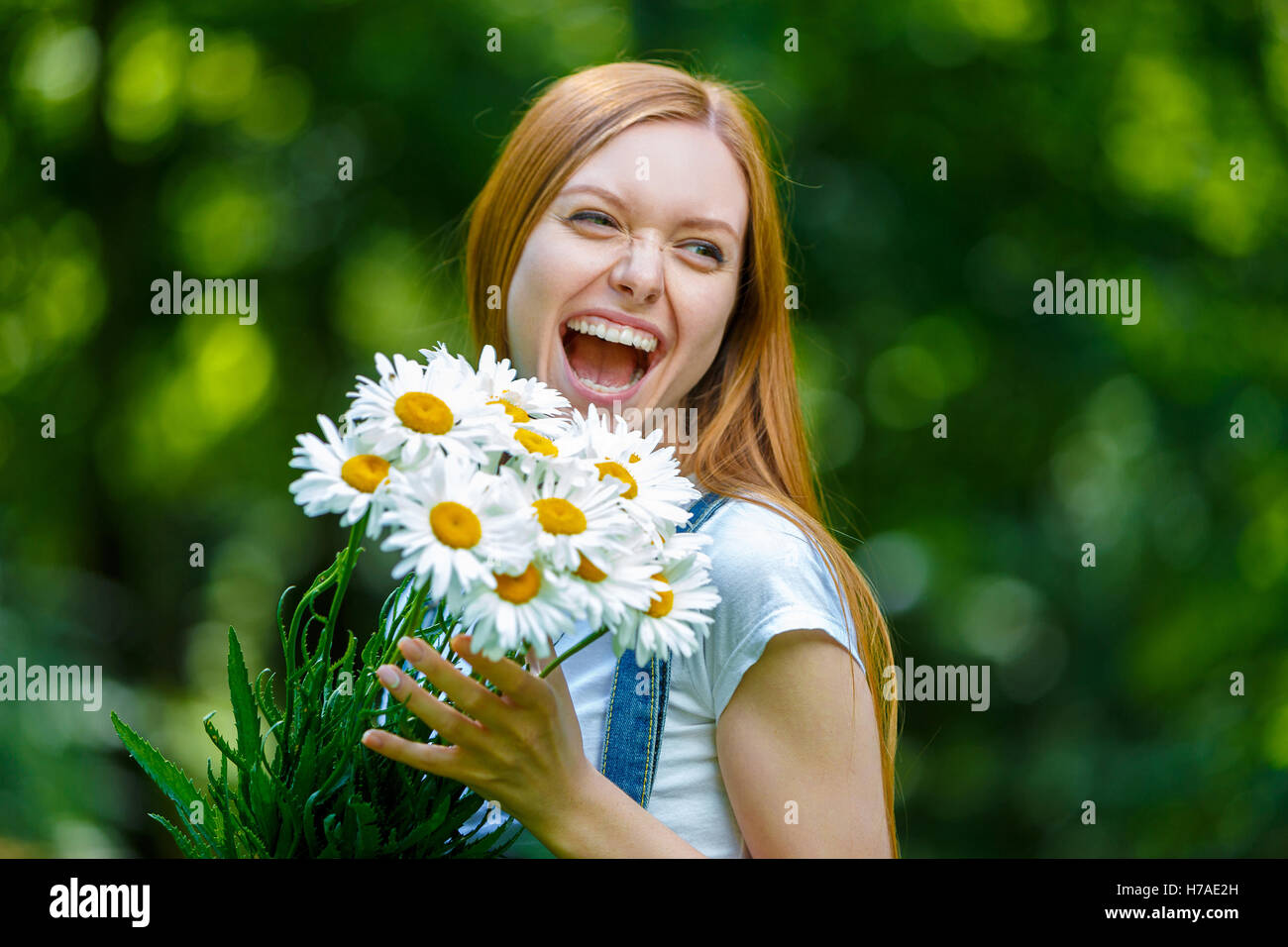 Beautiful smiling red-haired young woman Stock Photo - Alamy