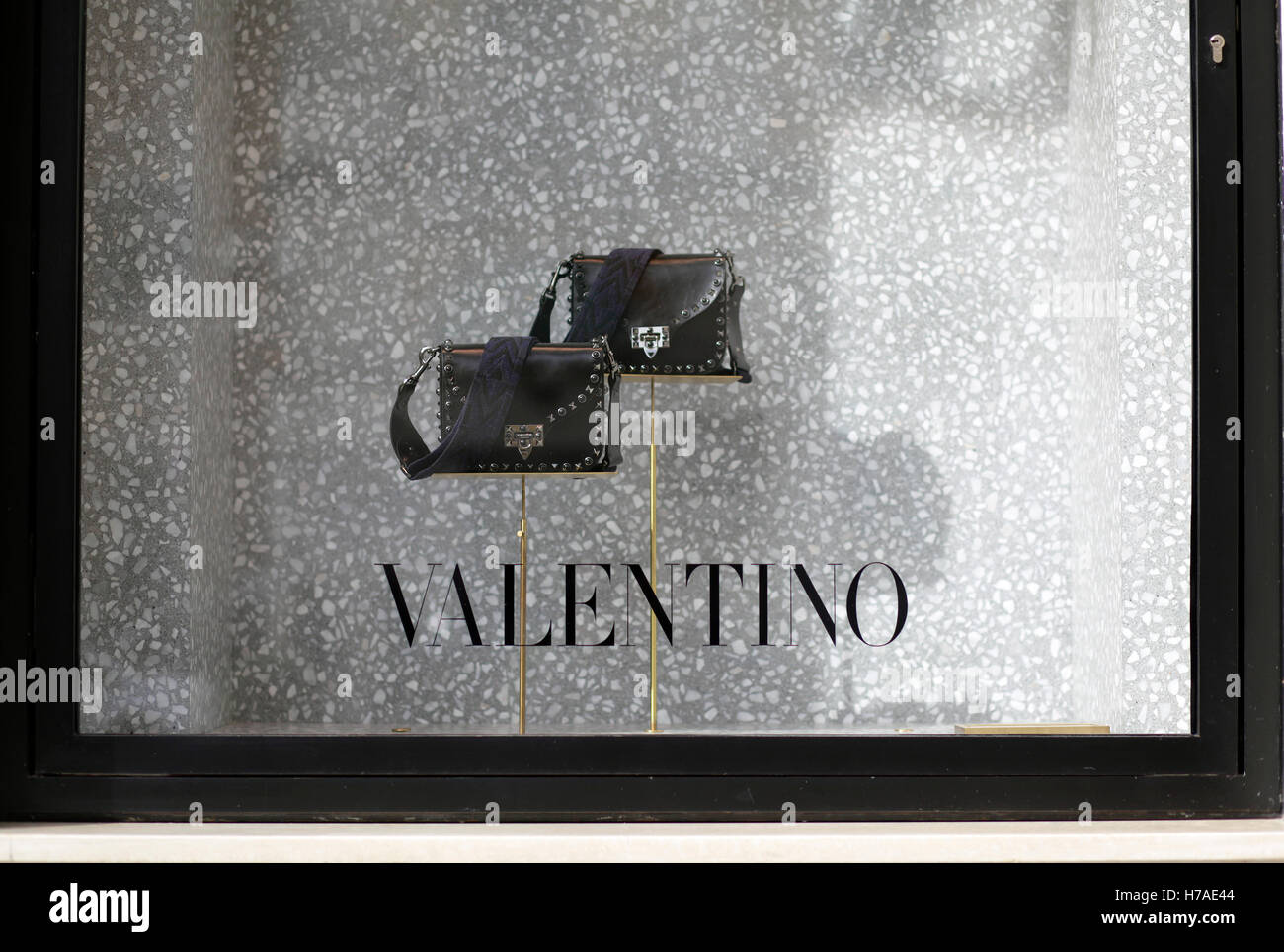 The shop window of Valentino store shows of the handbag Stock Photo - Alamy