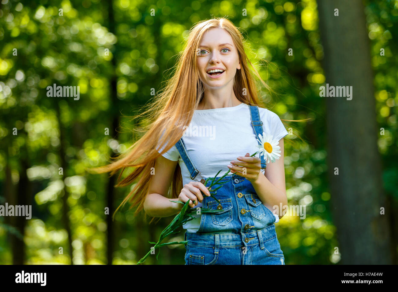 Beautiful smiling red-haired young woman Stock Photo - Alamy