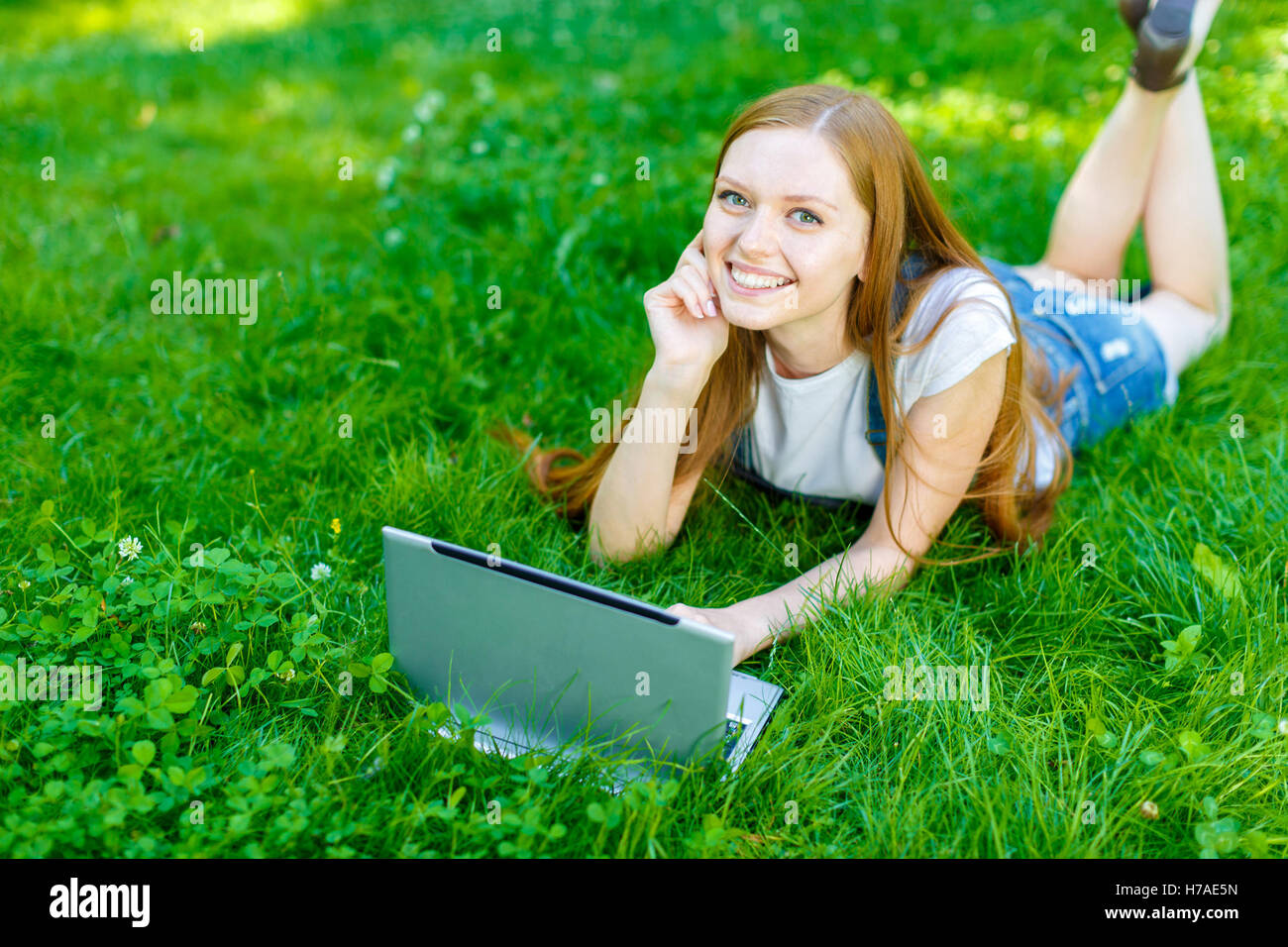 Beautiful smiling red-haired young woman Stock Photo - Alamy