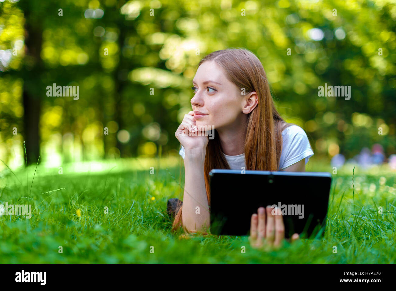 Beautiful smiling red-haired young woman Stock Photo - Alamy