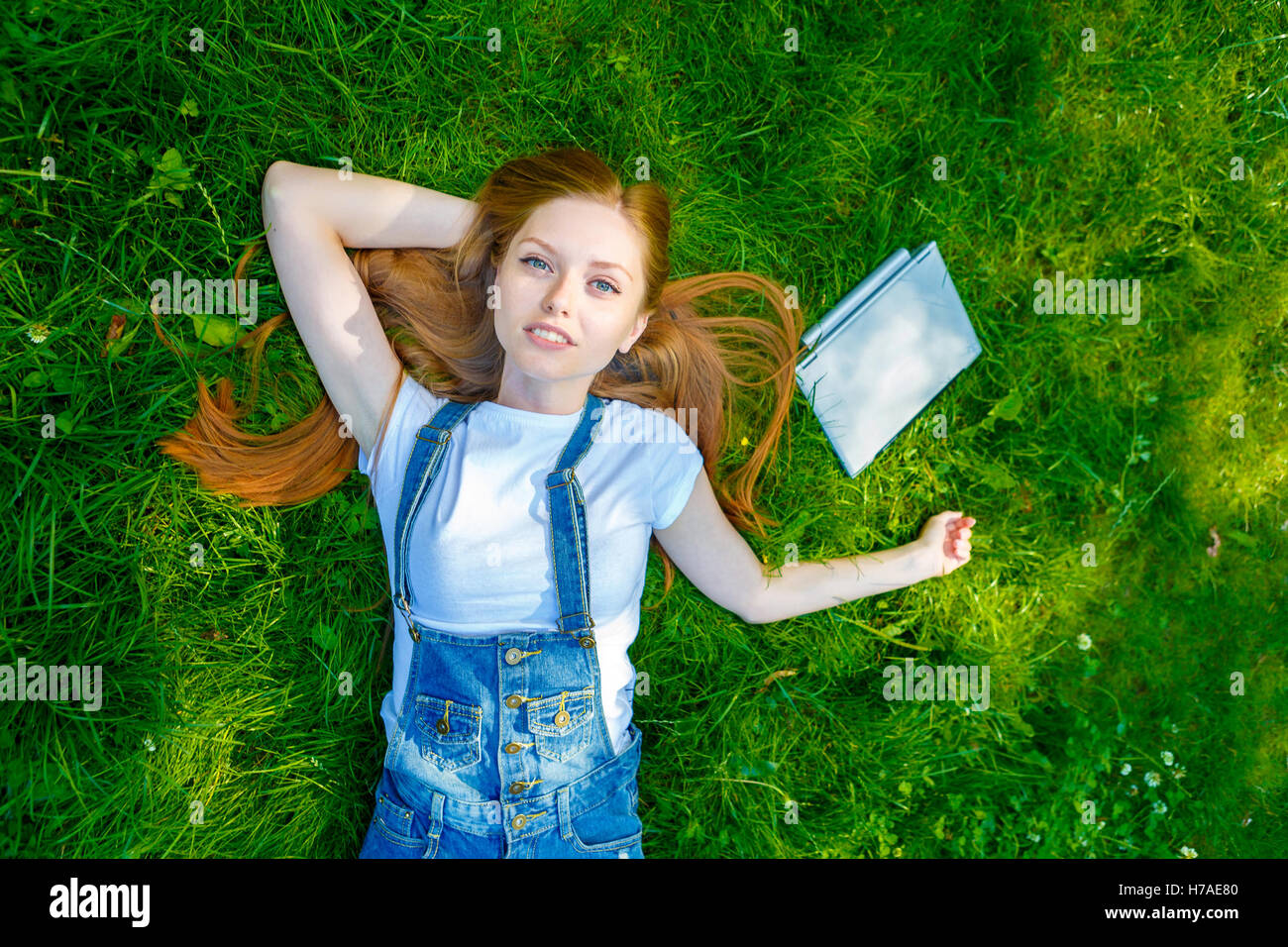 Beautiful smiling red-haired young woman Stock Photo - Alamy