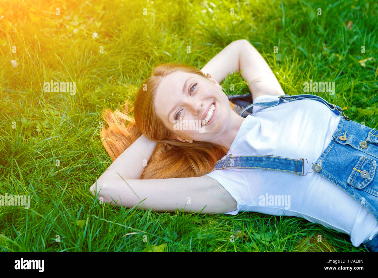 Beautiful smiling red-haired young woman Stock Photo - Alamy