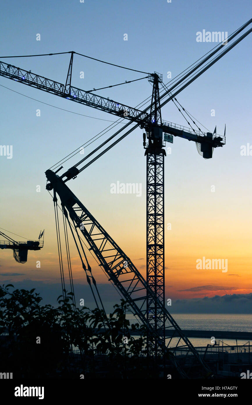 Sunset cranes hi-res stock photography and images - Alamy