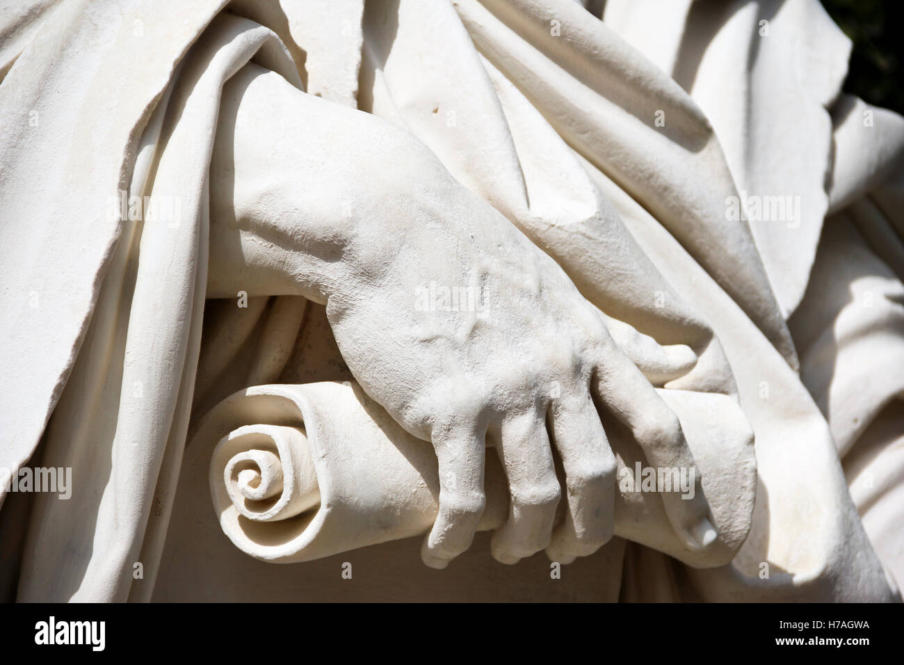 Holding A Scroll High Resolution Stock Photography and Images - Alamy