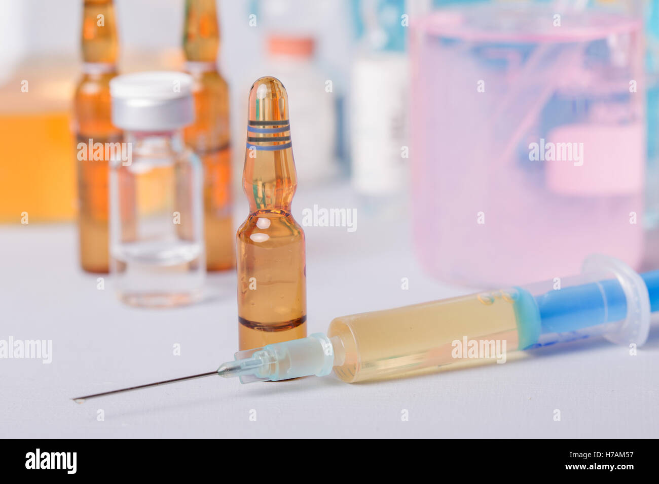 syringe with ampules of drugs Stock Photo - Alamy