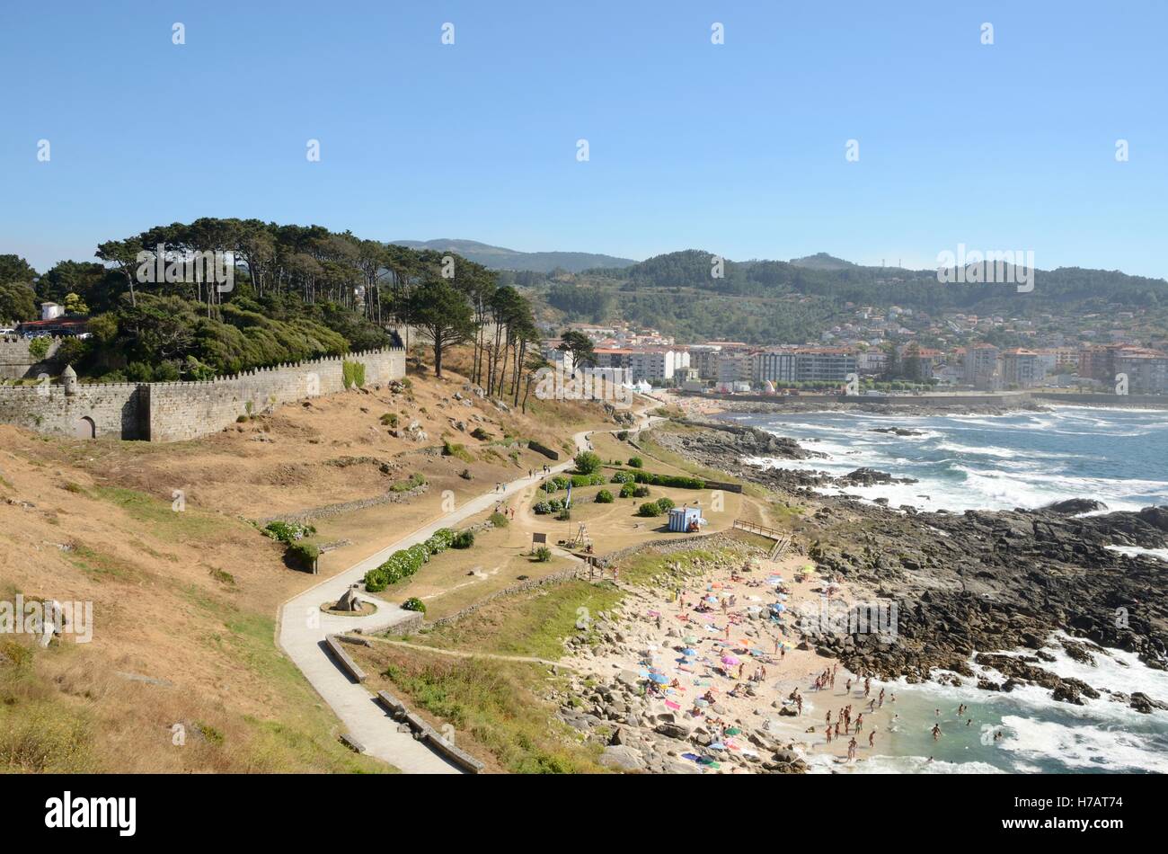Crowded beach next to Monterreal Castle in Ria of Vigo in Bayona ...