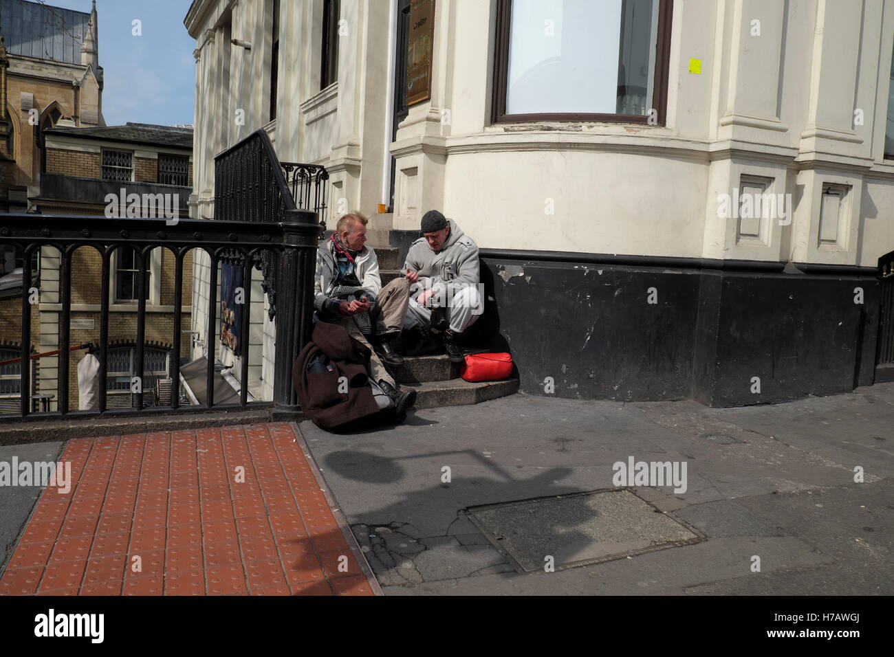 Seated on steps hi-res stock photography and images - Alamy