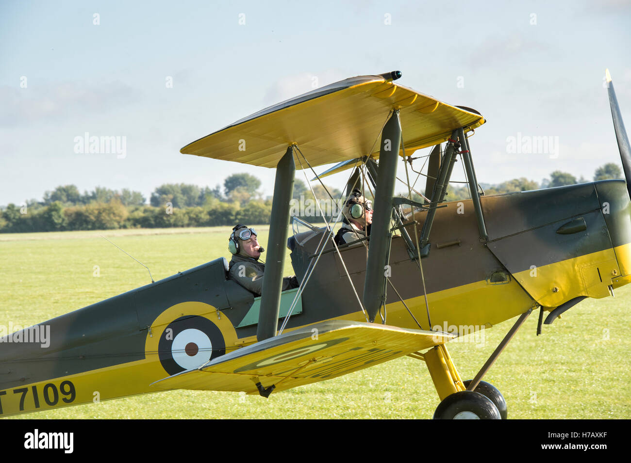 Pilots in a De Havilland Tiger Moth DH-82A T-7109 at Bicester heritage ...