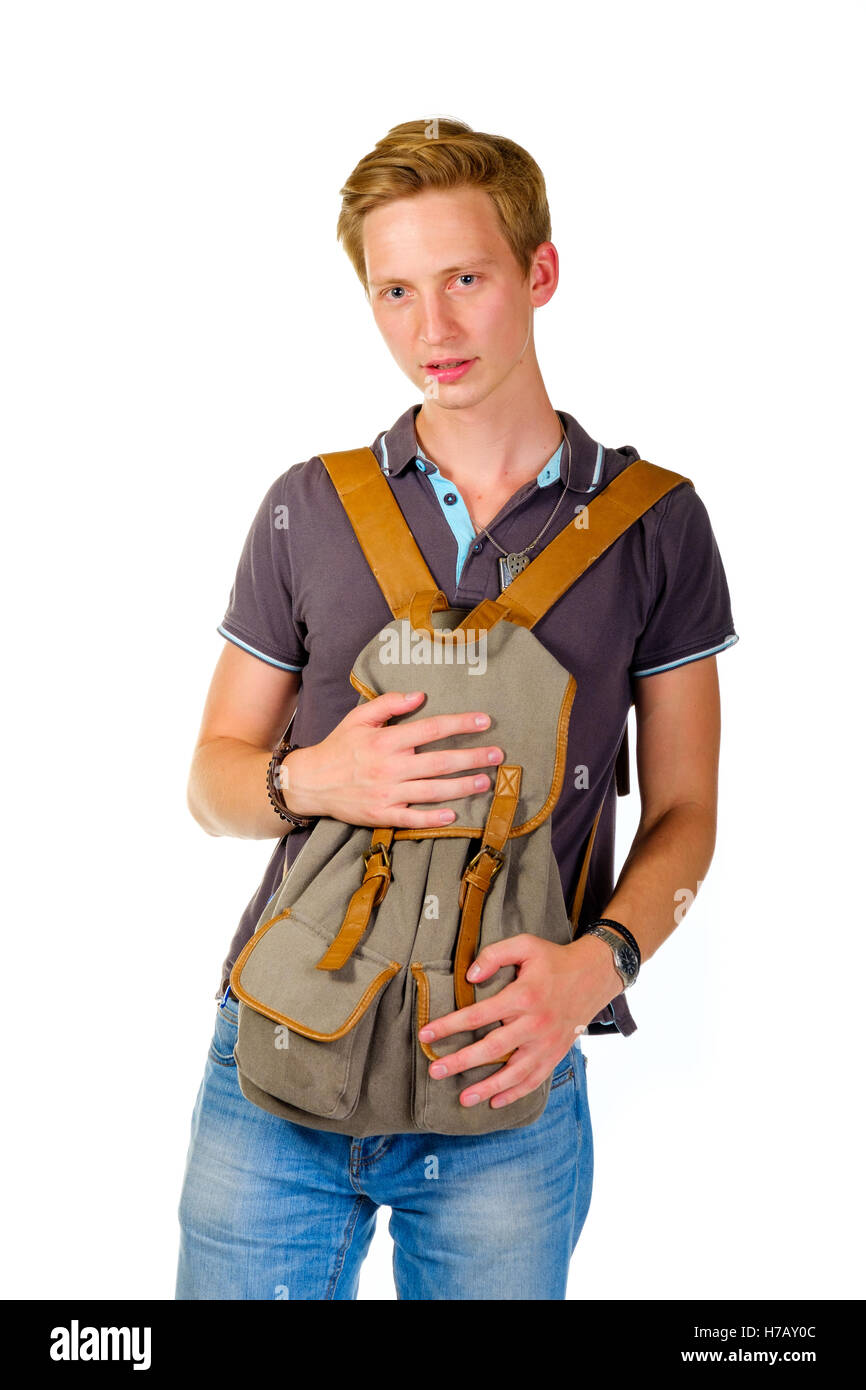Young boy holding a backpack in the front Stock Photo - Alamy