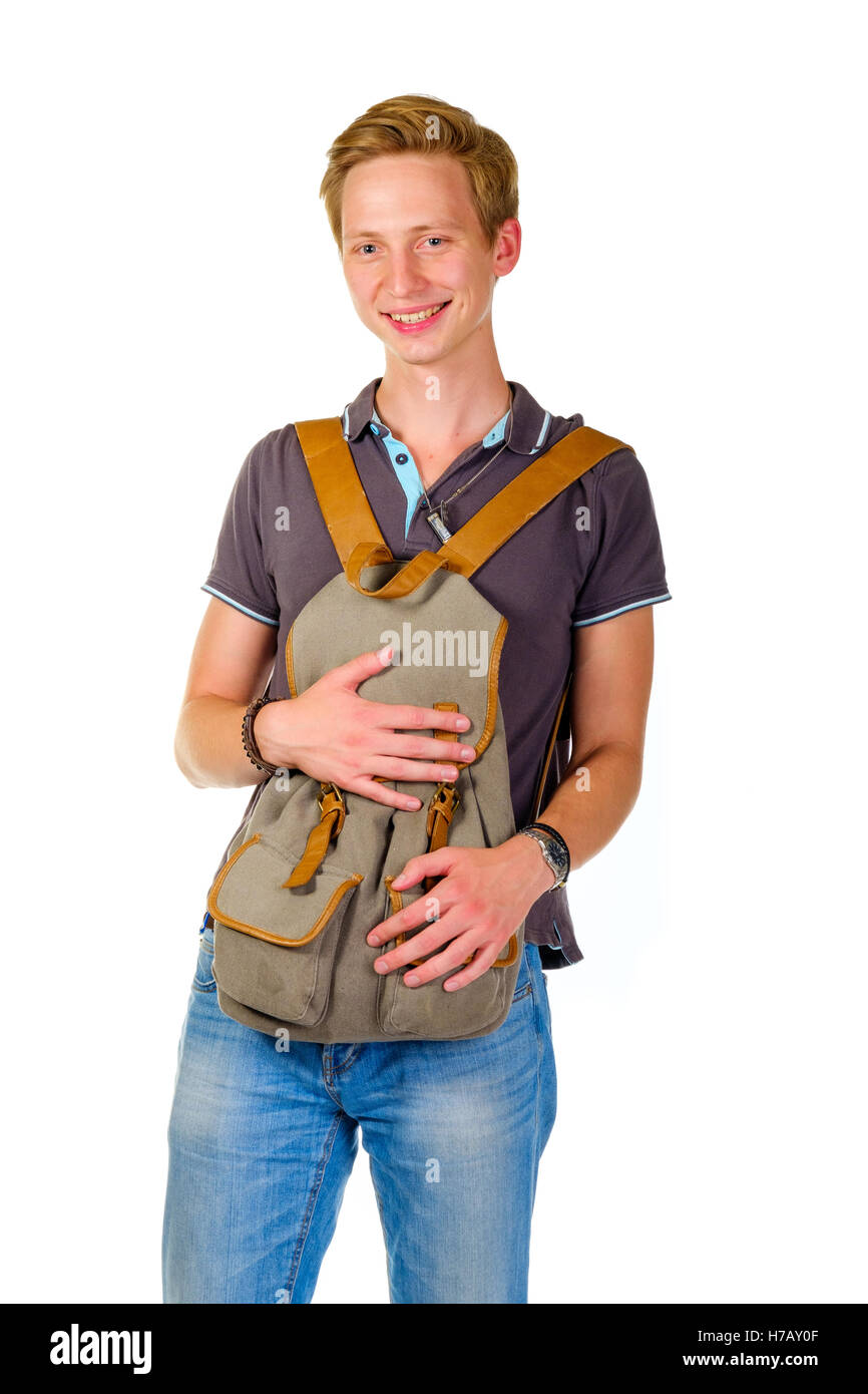 Young boy holding a backpack in the front Stock Photo - Alamy