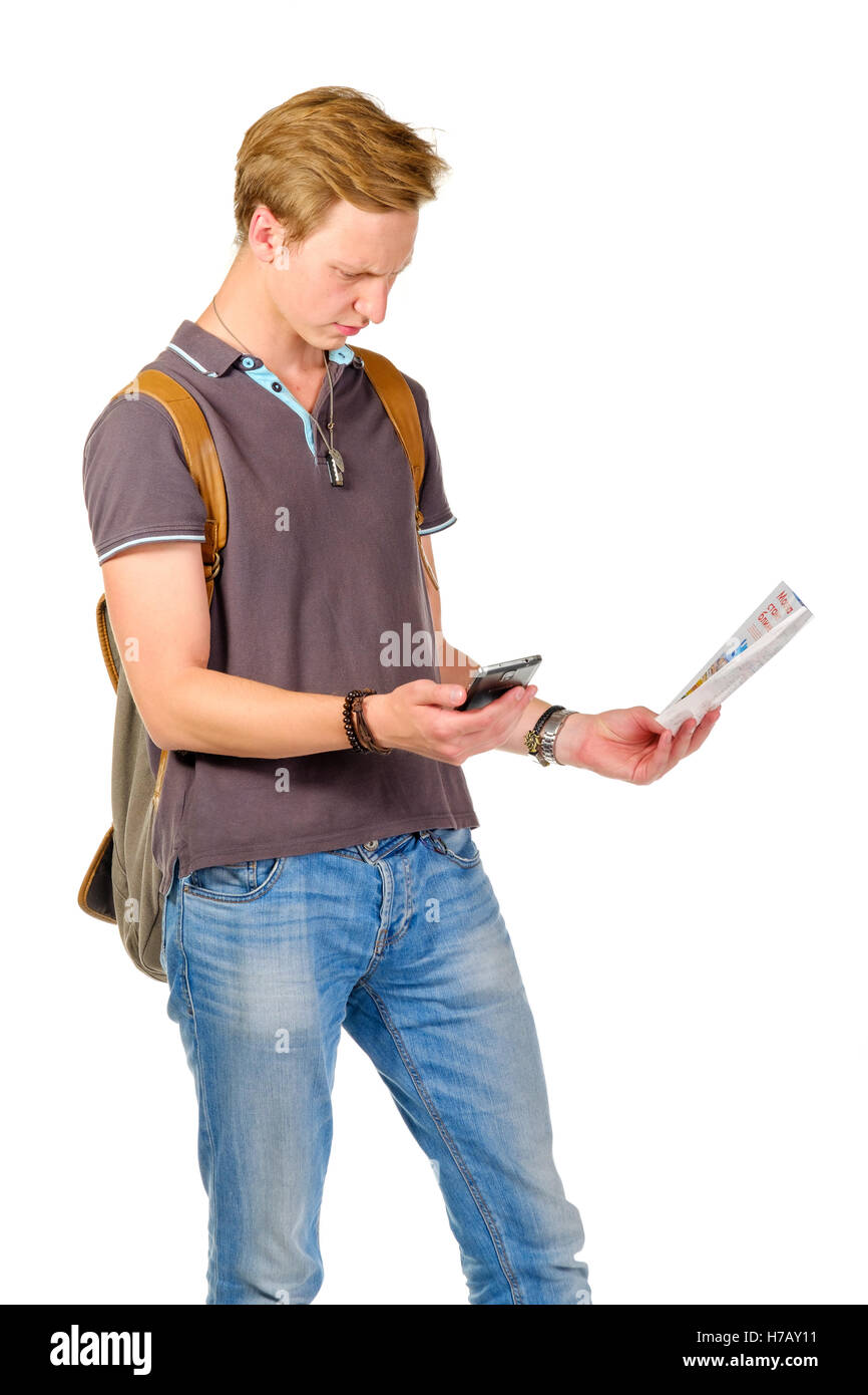 Young man traveler looking for a destination with map Stock Photo - Alamy