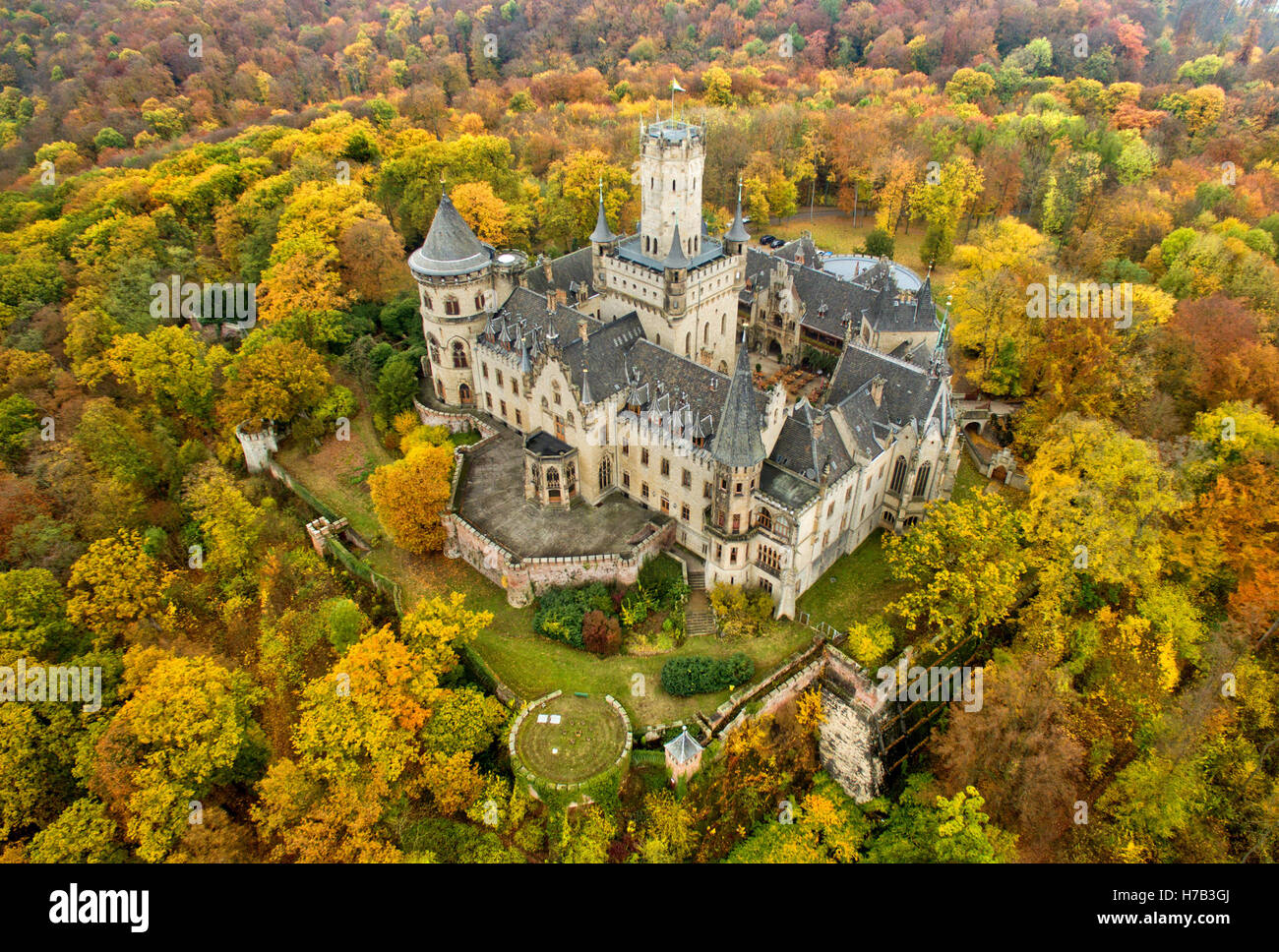 An aerial photo with a drone shows Marienburg Castle in a autumnal ...