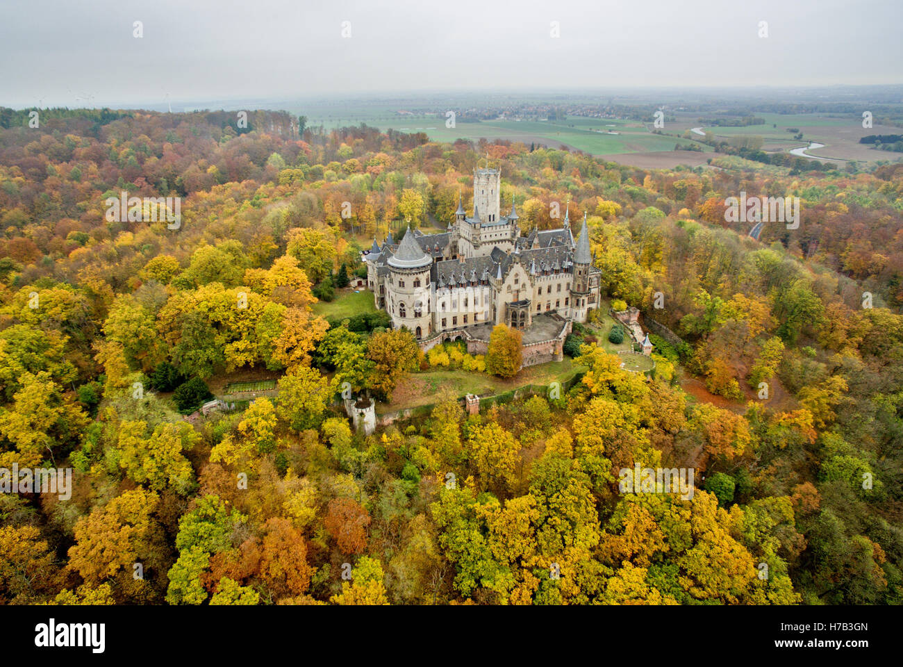 An aerial photo with a drone shows Marienburg Castle in a autumnal ...