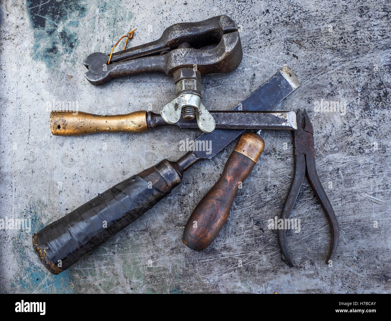 Old rusty small tools on metal background. Selective focus Stock Photo ...