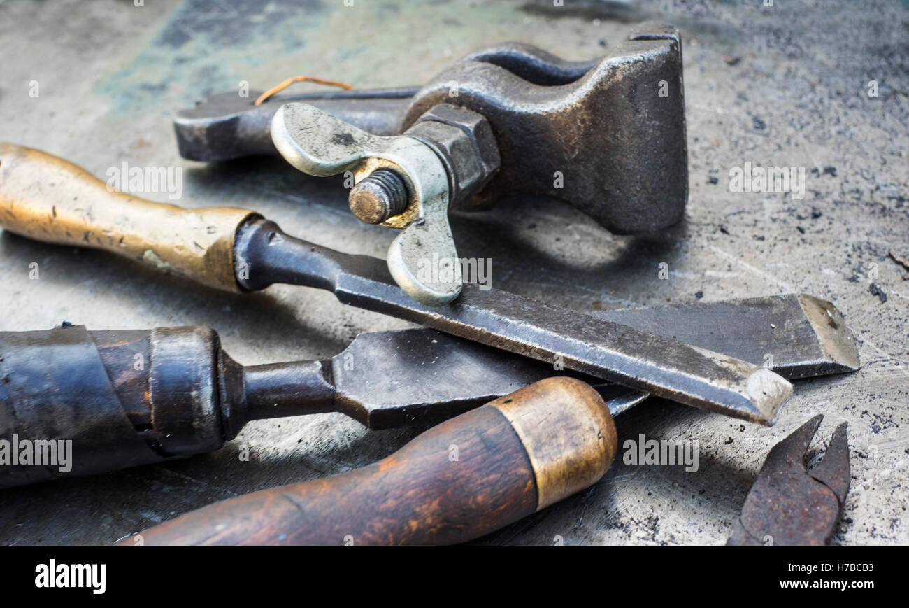 Old rusty small tools on metal background. Selective focus Stock Photo ...