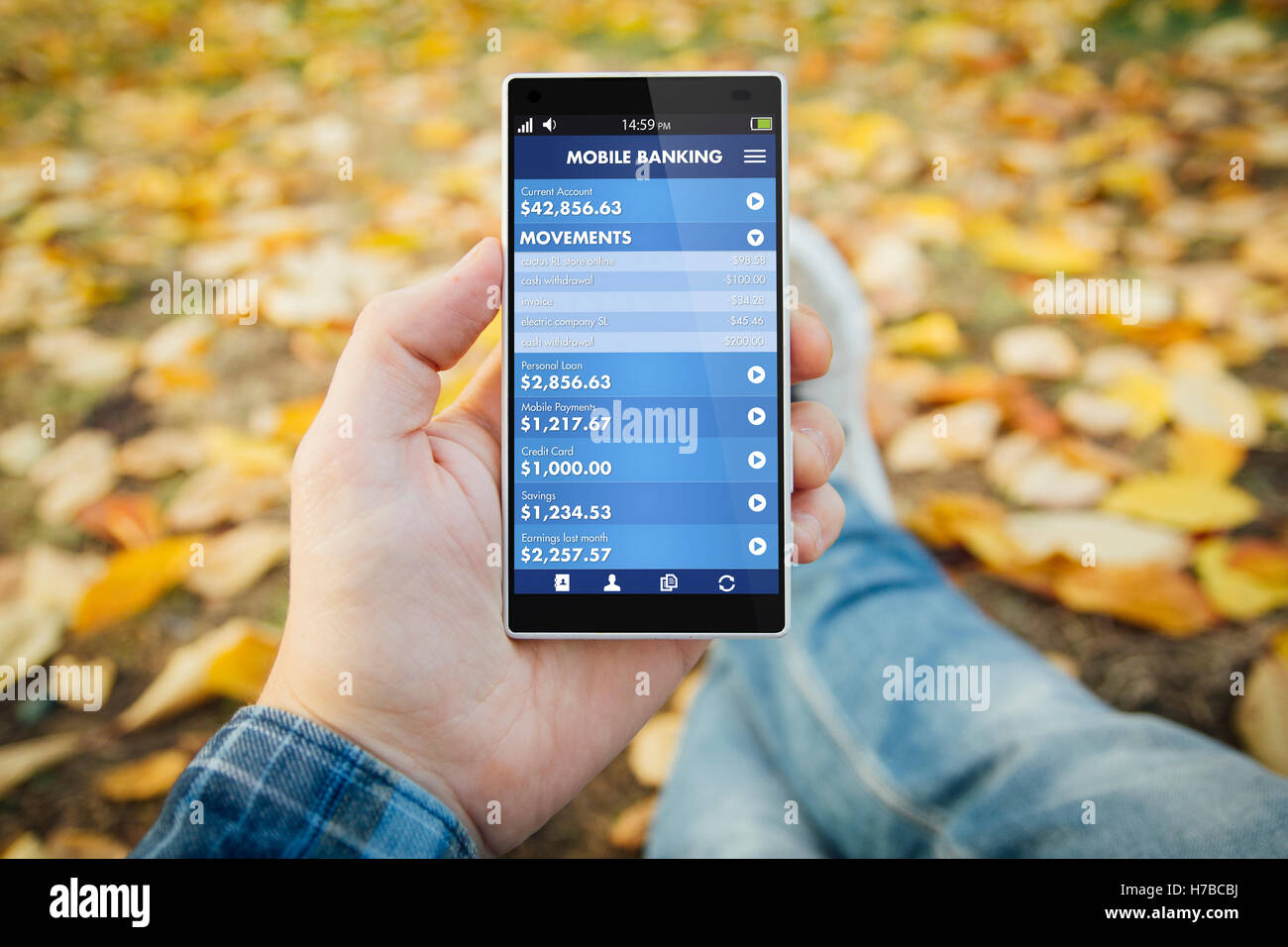 man in the park with mobile banking smartphone. All screen graphics are ...
