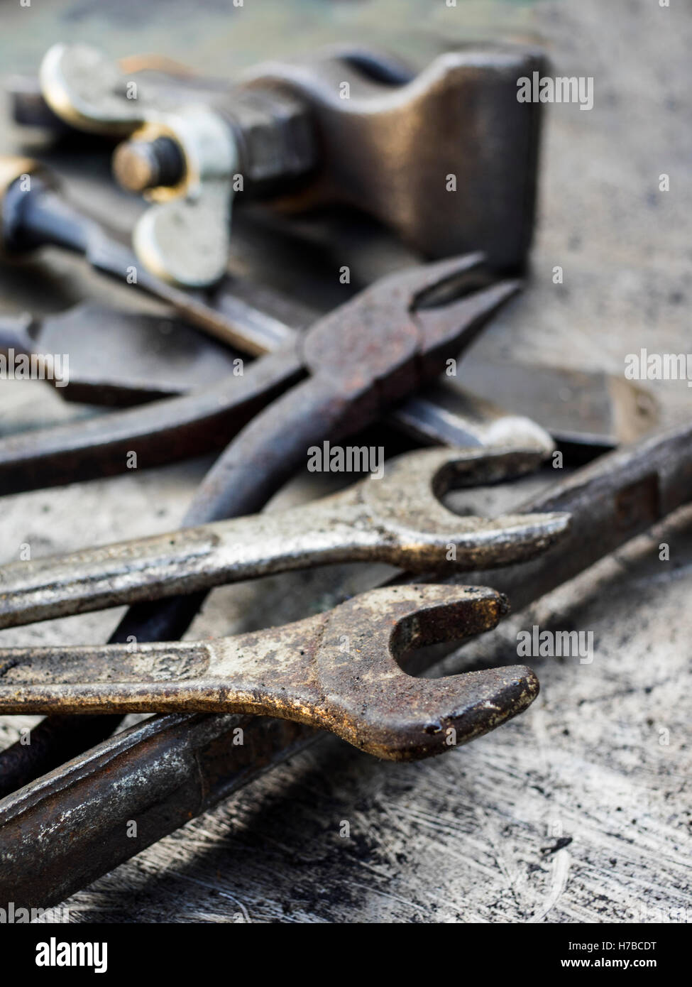 Old rusty small tools on metal background. Selective focus Stock Photo ...