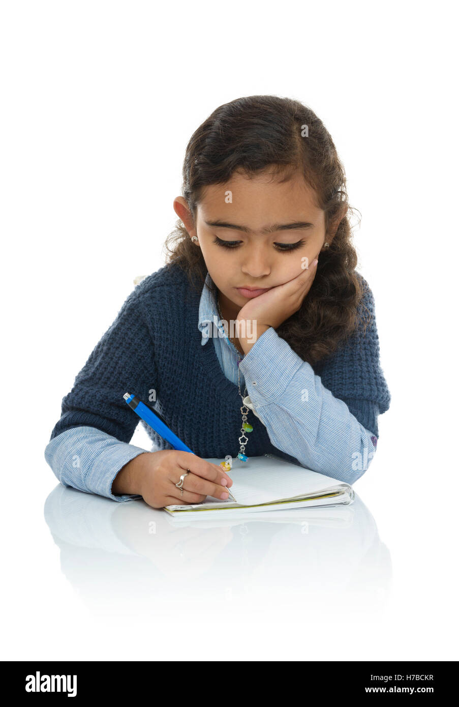 Cute Young Girl Writing Isolated on White Background Stock Photo - Alamy