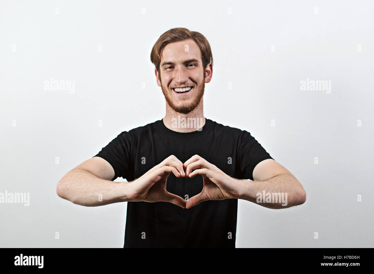 Male hand giving heart valentine hi-res stock photography and images ...