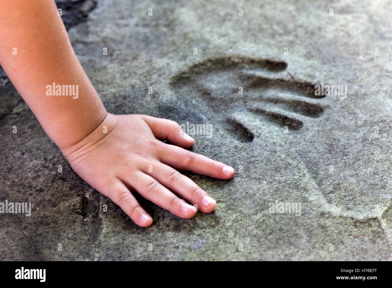 Hand print in concrete hi-res stock photography and images - Alamy