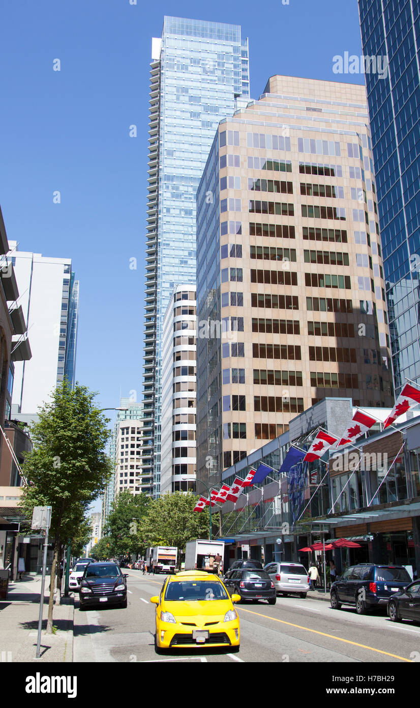 The view of a yellow car in Vancouver downtown (British Columbia Stock ...
