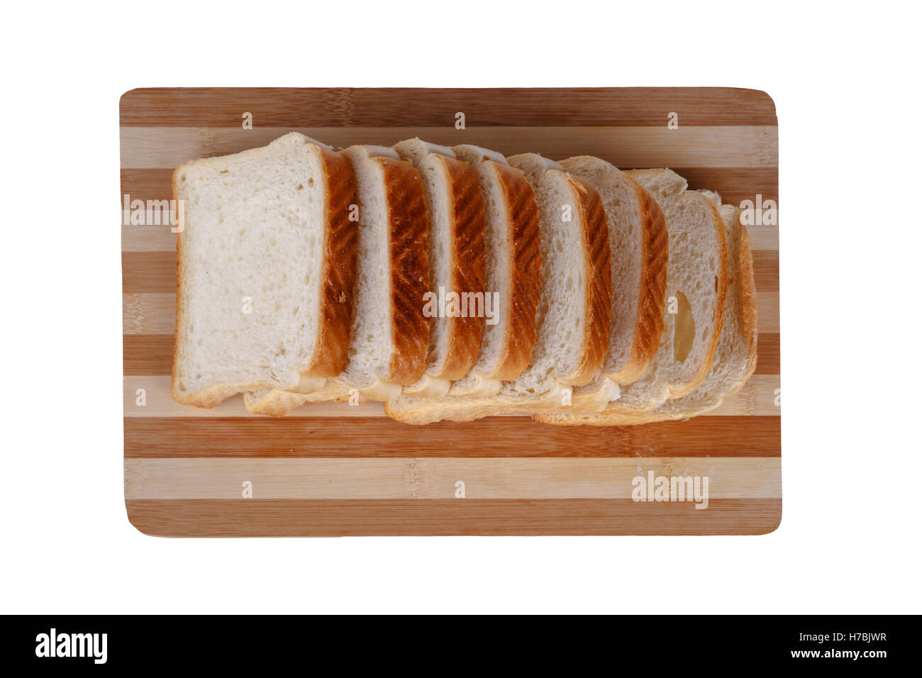 Top view of slices of toast bread on breadboard, isolated on white ...