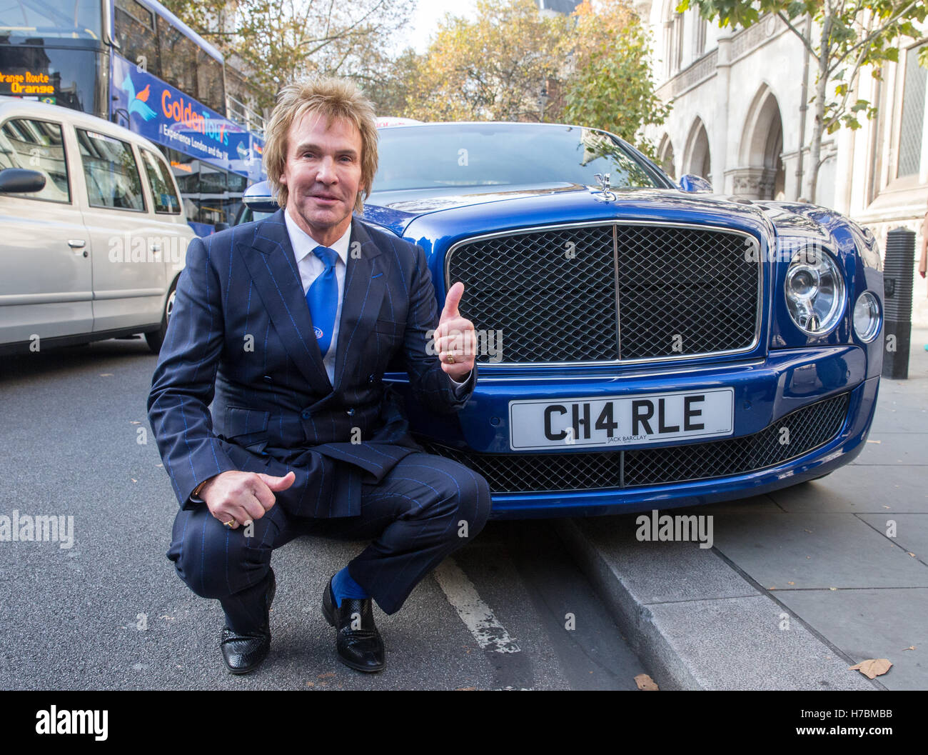Managing Director of Pimlico Plumbers,Charlie Mullins,gives the thumbs ...