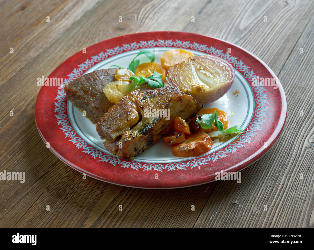 Roasted iberico pork loin close up Stock Photo - Alamy
