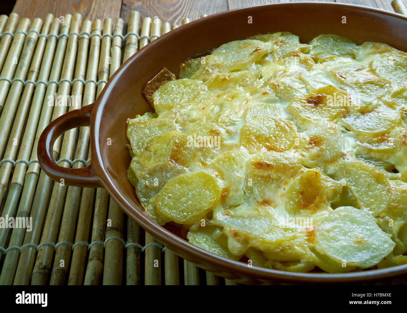 Pommes Anna classic French dish of sliced, layered potatoes cooked in a ...