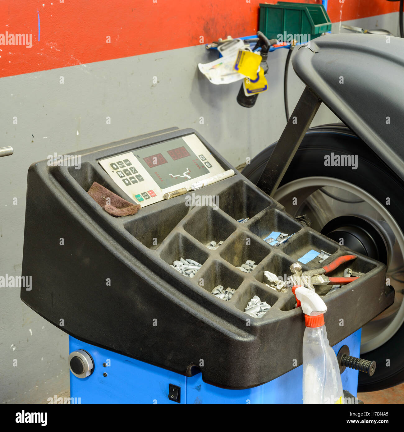 Various tools and stuff in a tire fix workshop and a diplay of ...