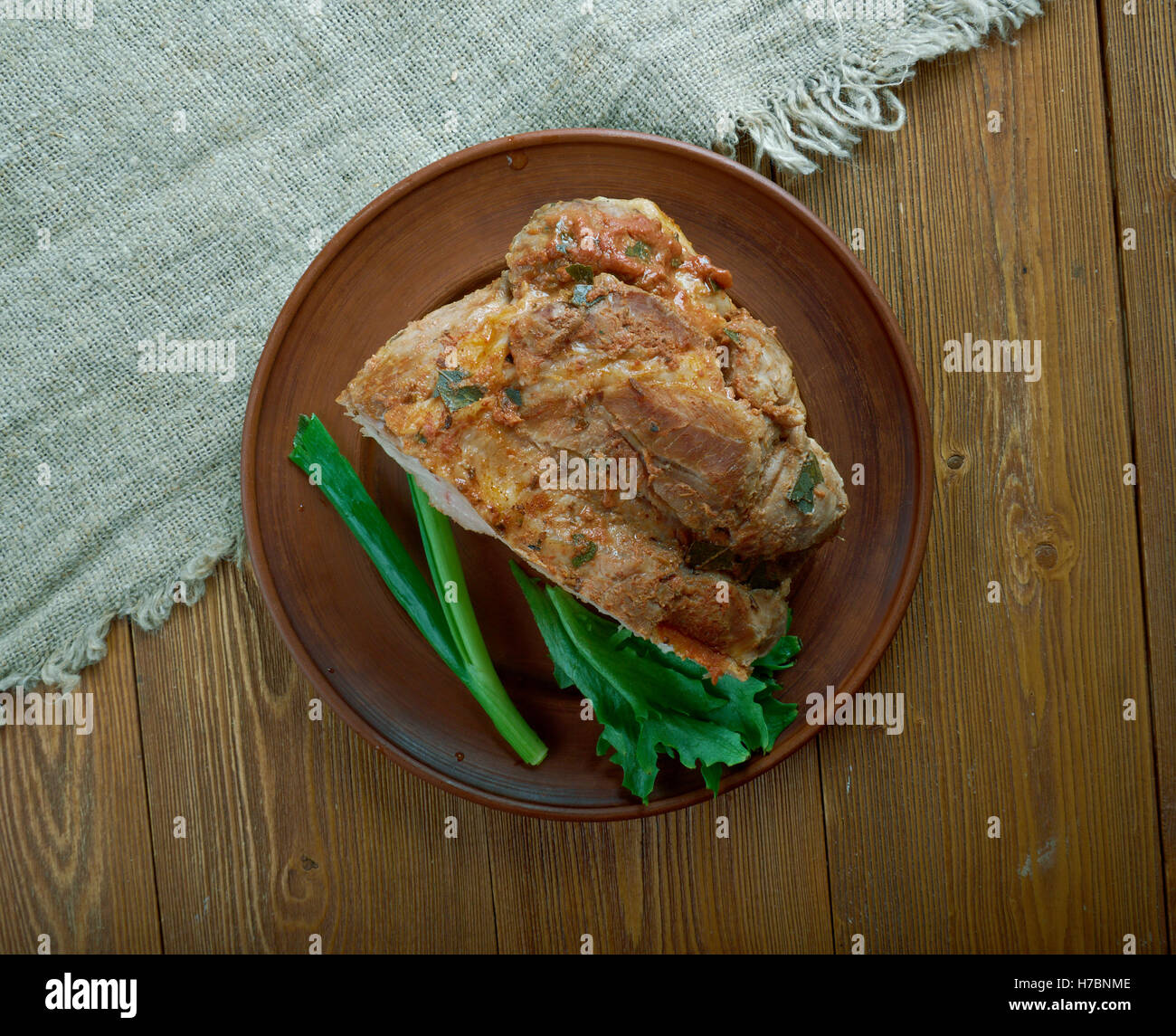 Kumpis - Lithuanian pork cooked ham.the old wooden background ...