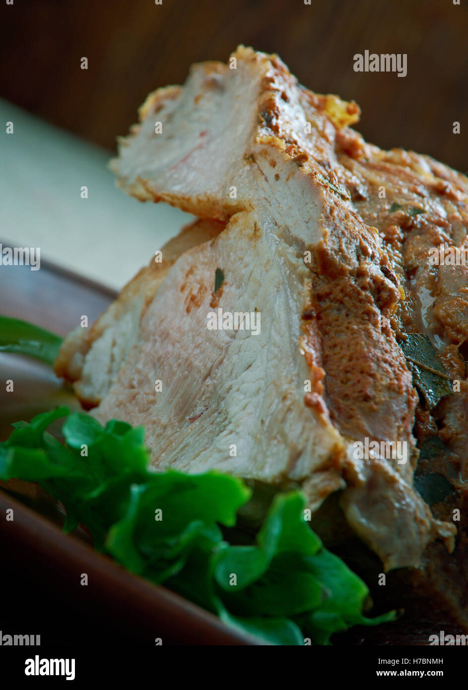 Kumpis - Lithuanian pork cooked ham.the old wooden background ...