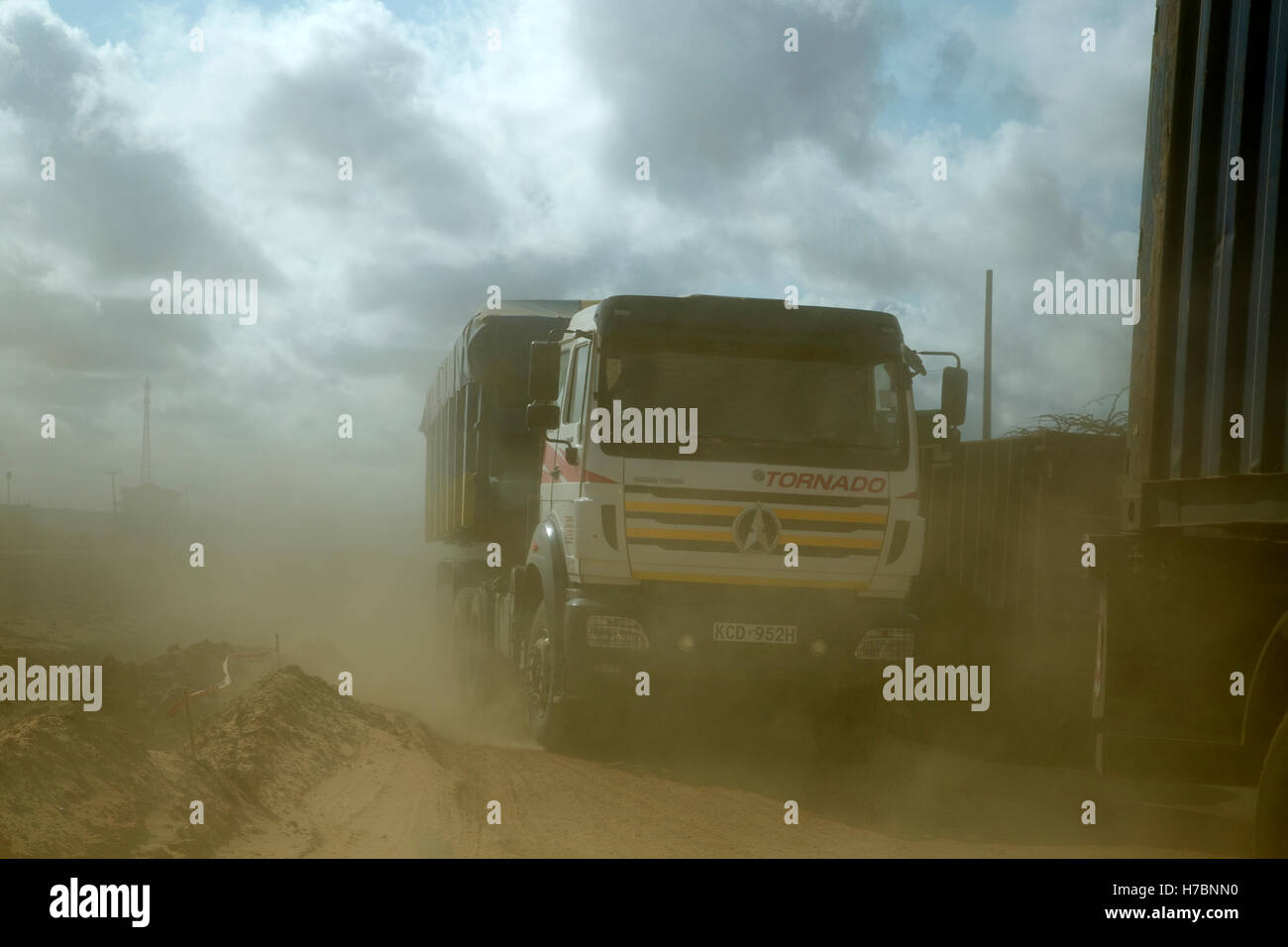 Lorry driving on unmade dirt road Mombasa Rd Kenya Stock Photo - Alamy