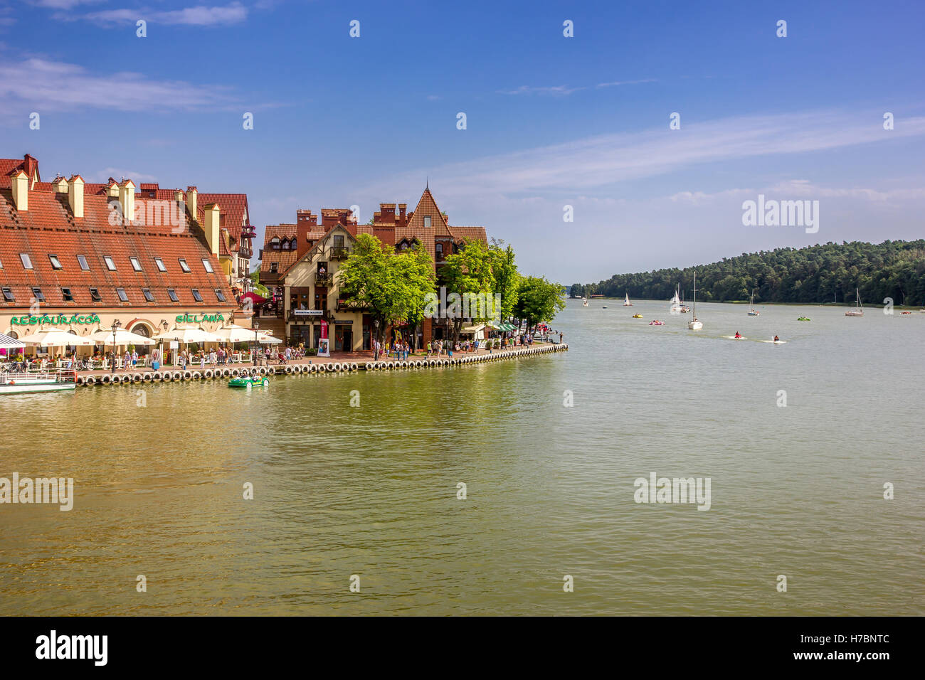 The town Mikolajki in the Masuria region in Poland, with a lake and ...