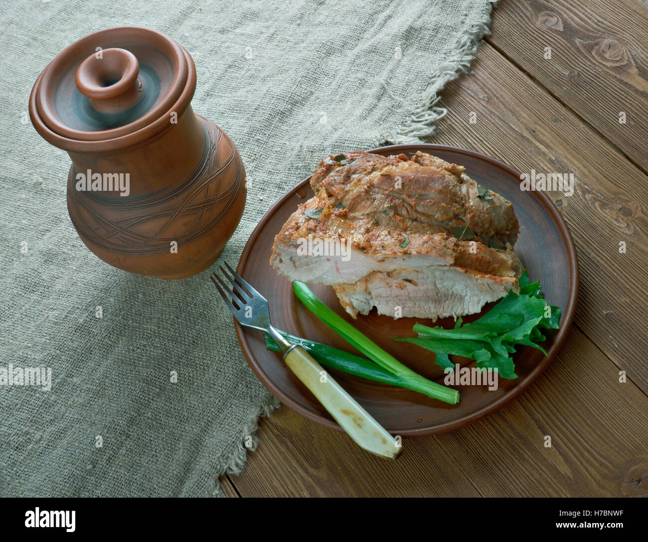 Kumpis - Lithuanian pork cooked ham.the old wooden background ...