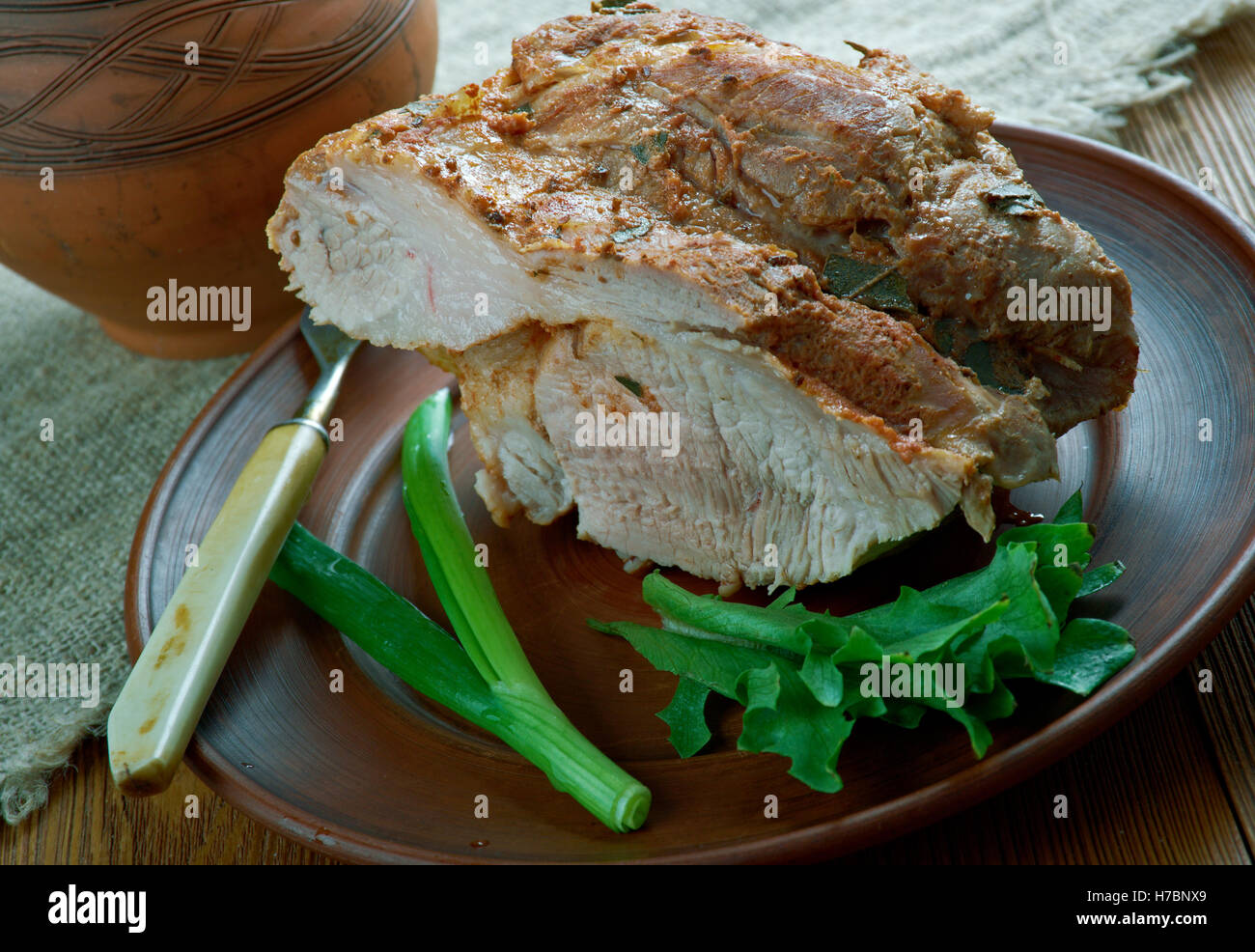 Kumpis - Lithuanian pork cooked ham.the old wooden background ...