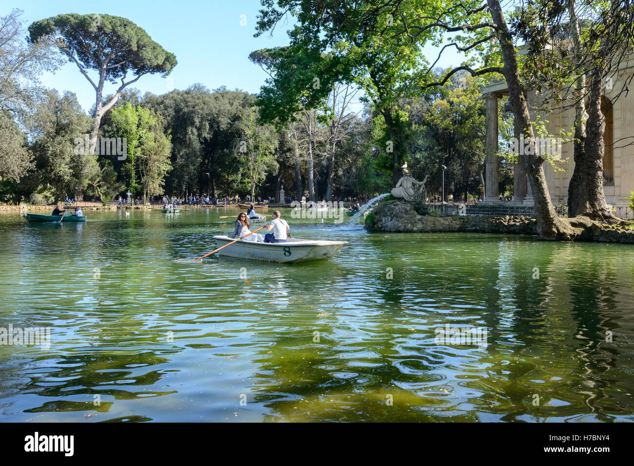 Nice lake called Borgese in a public garden in Rome, Italy, people in a ...