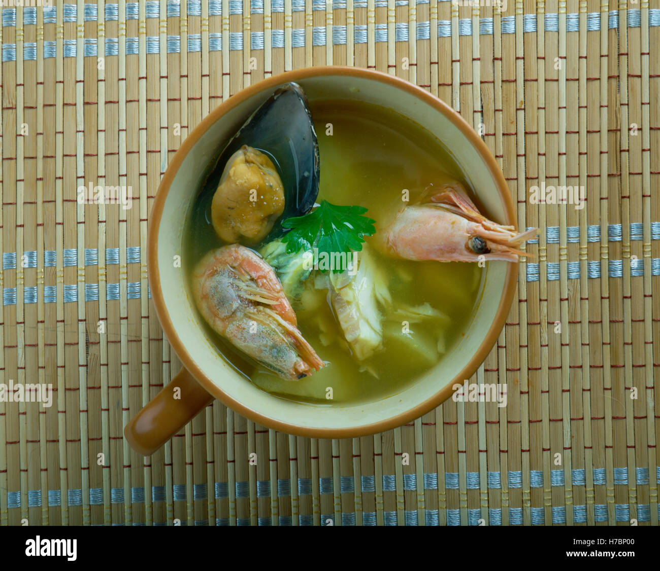 British seaside chowder with saffron Stock Photo - Alamy