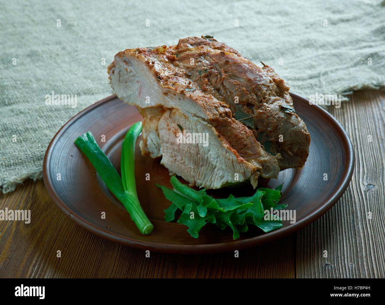 Kumpis - Lithuanian pork cooked ham.the old wooden background ...