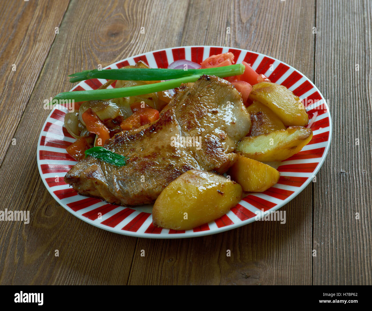 sipulipihvi - Onion steak.Finnish version of pork steak Stock Photo - Alamy
