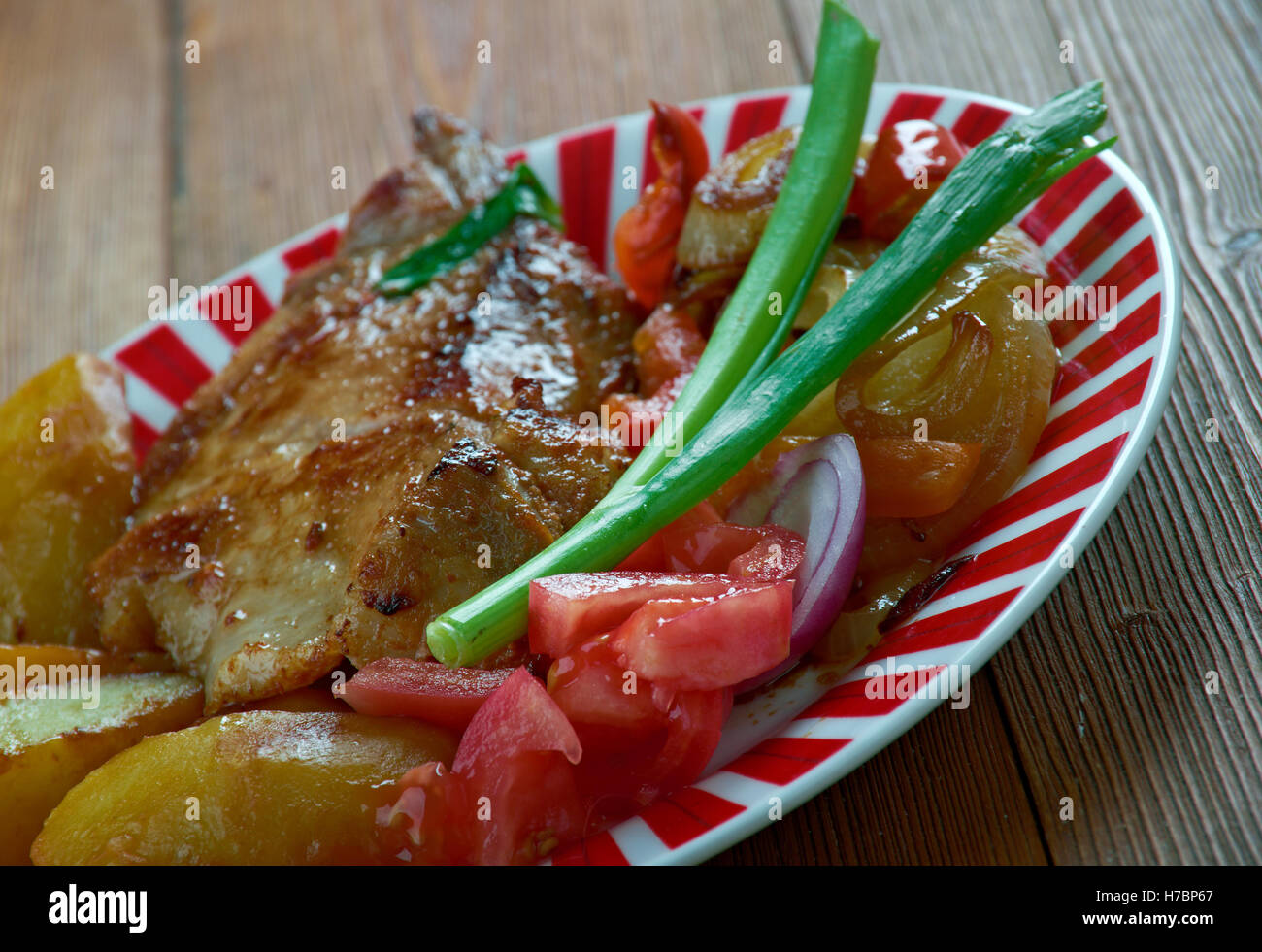 sipulipihvi - Onion steak.Finnish version of pork steak Stock Photo - Alamy