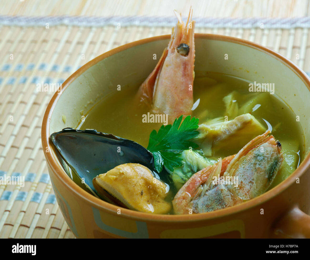 British seaside chowder with saffron Stock Photo - Alamy